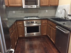 Backsplash recommendations for black fantasy leathered granite?