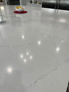 Anyone have Daltile One Quartz countertops?