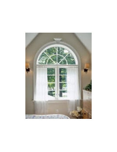 New construction with arched windows in the elevation