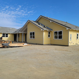 75 Beautiful Yellow Board and Batten Exterior Home Pictures & Ideas ...