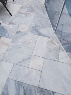 HELP!! Mystery stains on new marble pool deck