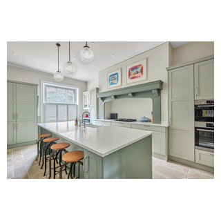 Capri White Gemini Quartz worktops with sage green cabinetry - Rustic ...