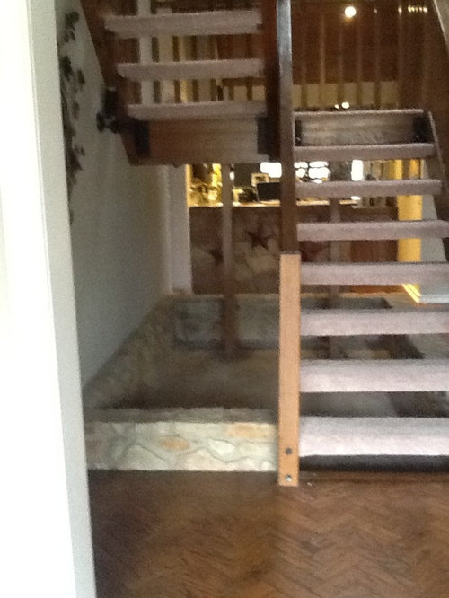 Need help for empty space under stairs