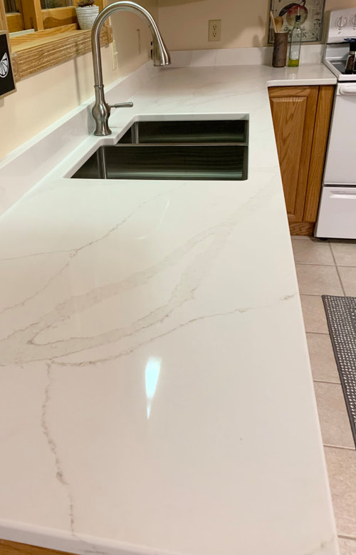 Need help. Tile above 4 inch backsplash