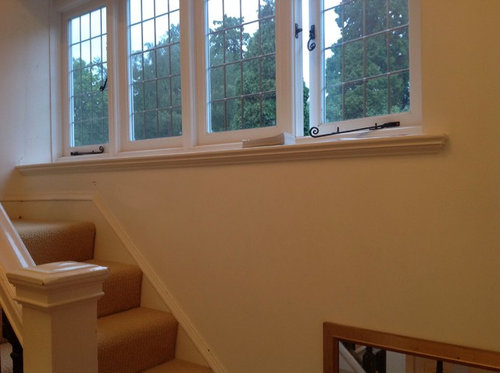Any ideas for window covering on this long window along the stairs ...