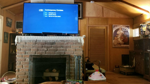 What do I do with this monster fireplace hulking mid room?