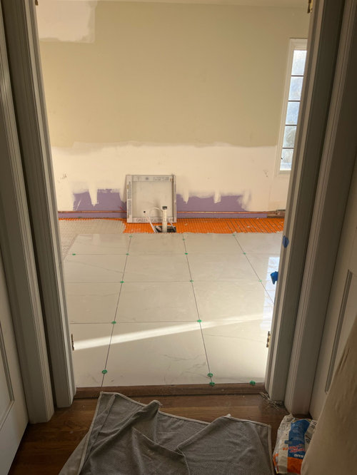 how to lay 24x24 tile transitional bathroom?