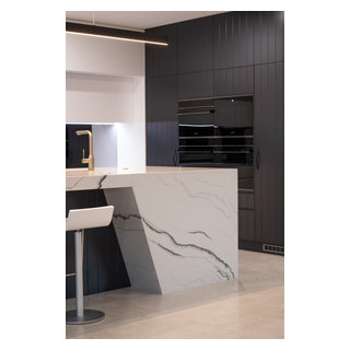 Award-winning kitchen features versatile and beautiful Bianco Molasa ...