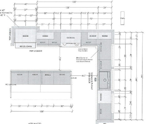 Kitchen cabinets and range placement