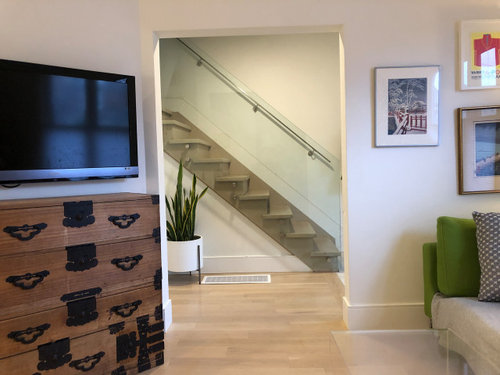 Living room with angled wall layout