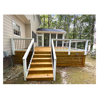 Rustic Deck with Lateral Skirting and Three-Season Room - Transitional ...