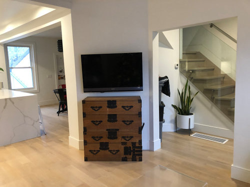 Living room with angled wall layout