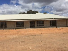Farm house exterior colour scheme - colorbond cladding | Houzz AU