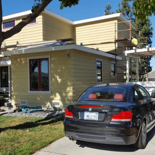 75 Beautiful Yellow Board and Batten Exterior Home Pictures & Ideas ...