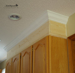 How to take my staggered cabinets to the 9ft ceiling?