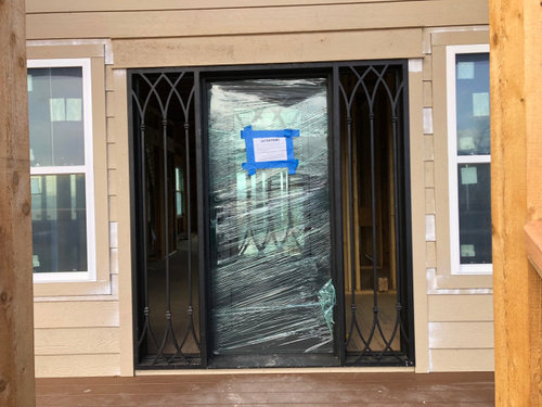 Front door lower than windows so tops don’t align, uneven