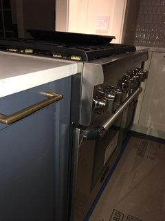 How flush should my thermador range be to front of cabinets/counter?