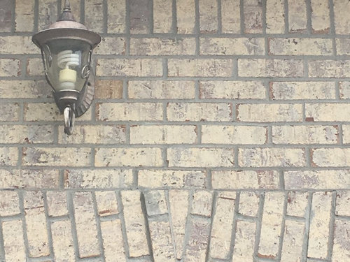 Off center exterior light - what to do?