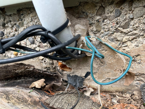 Best way to waterproof hole for electrical wires in exterior concrete