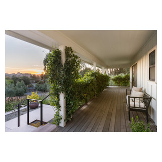 Front entry ipe veranda transition to concrete stairs - Farmhouse ...