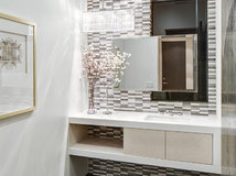 Built-ins Boost Storage in Small Bathrooms