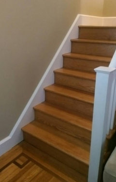 How should we transition the baseboards, and stairs here?
