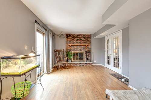 Narrow family room with too many doors