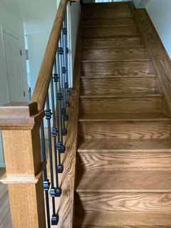 Stairs facing front door entrance