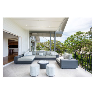 Sophisticated outdoor living area with custom made poufs - Modern ...