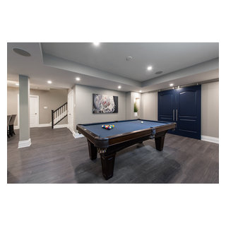 A basement with a hue of blue and sparkle - Transitional - Basement ...