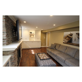 Basement recreation room with new stone fireplace and built-ins ...
