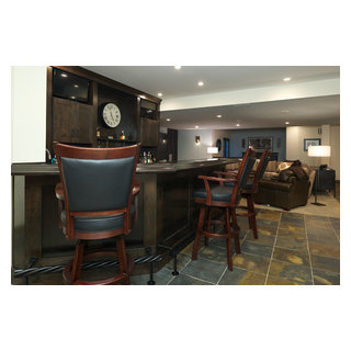 Inside a Unique English Country Exterior - Transitional - Basement ...