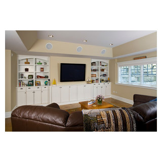 Lower Level Family Room with English Windows and Recessed Panel Built ...
