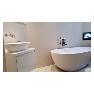 Matching limestone egg shaped basin and bath in Coleherne Court, South ...