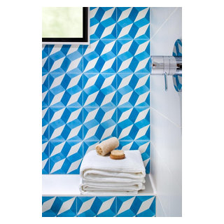 spunky, contemporary bathroom featuring clé cement tile shower wall ...