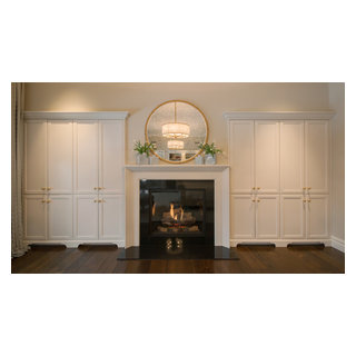 Custom Mantle, Bookshelves, and Wardrobe Cabinetry in Master Suite ...