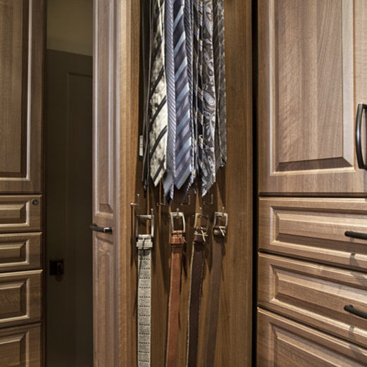 75 Closet with Raised-Panel Cabinets and Medium Tone Wood Cabinets ...