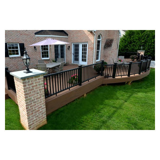 Curved portion of deck; Custom Brick Columns to match house ...