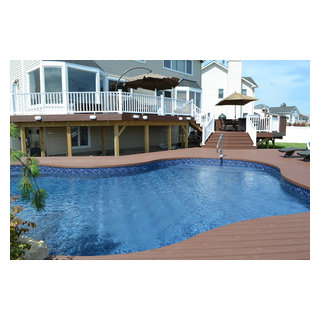 : Elegant Multi-Level Deck and Freeform Pool: In order to bring the ...
