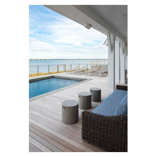 Rear pool deck under overhang - Beach Style - Deck - New York - by ...