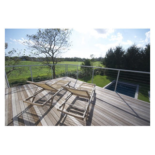 The 2nd floor deck offers views of the neighboring farm field ...