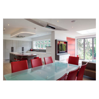 Gloss and wood kitchen with red breakfast bar - Modern - Dining Room ...
