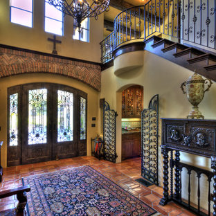 75 Beautiful Terra-Cotta Tile Entryway with a Dark Wood Front Door ...
