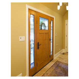Arched Center Dormer Inspires Welcoming Arrival - Traditional - Entry ...