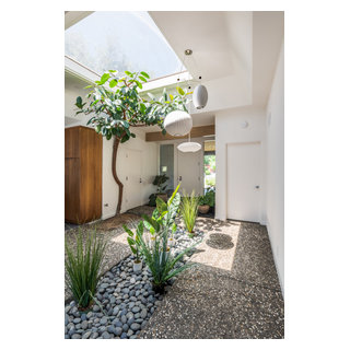 Beautiful Entry With Massive Skylight, Atrium, and Abstract Lantern ...