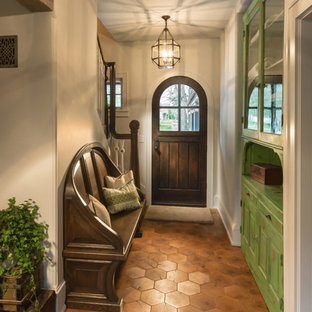 75 Beautiful Terra-Cotta Tile Entryway with a Dark Wood Front Door ...