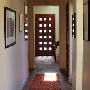 75 Beautiful Terra-Cotta Tile Entryway with a Dark Wood Front Door ...