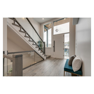 Contemporary Front Entry with High Ceiling & Large Windows ...