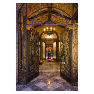 Entry Courtyard with hand forged Iron work sets the stage ...