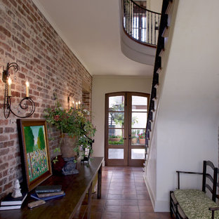75 Beautiful Terra-Cotta Tile Entryway with a Dark Wood Front Door ...